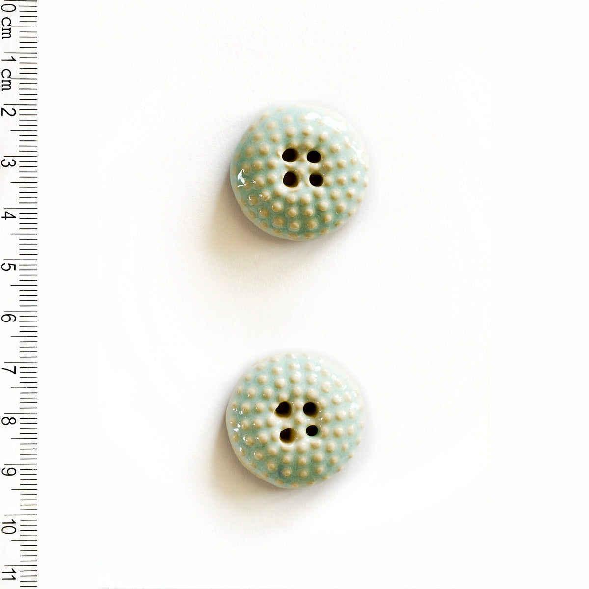 L590 Raised Dot Buttons – ButtonMad